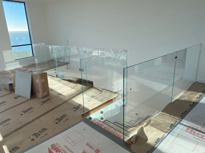 Glass railing with standoff mount. No top cap. - Integrity Glass